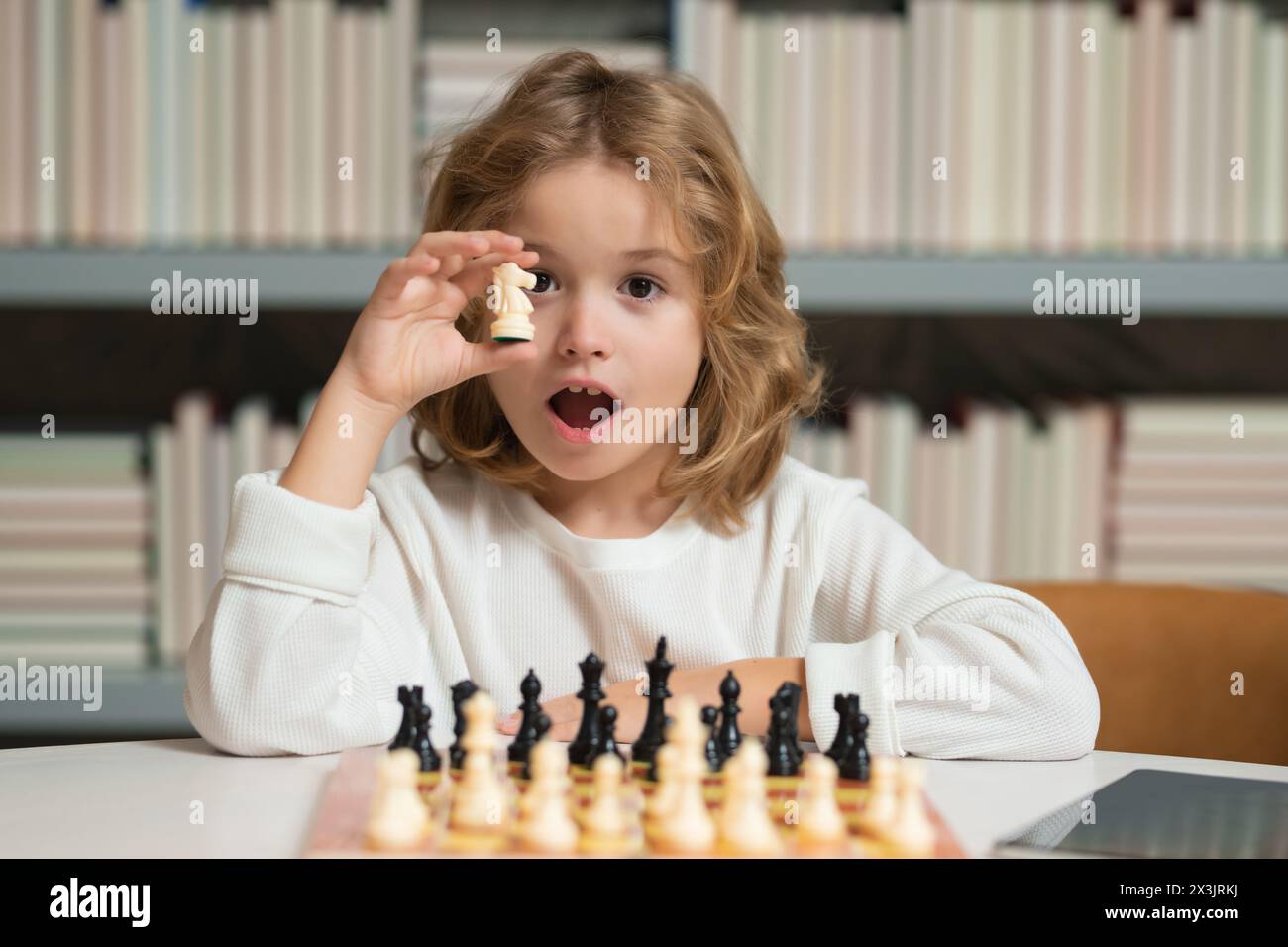 Smart thinking kids boy hi-res stock photography and images - Alamy