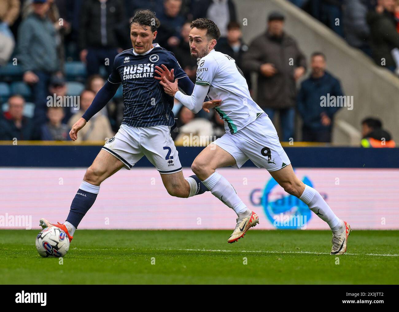 Ryan Hardie of Plymouth Argyle battles for the ball with Dan McNamara ...
