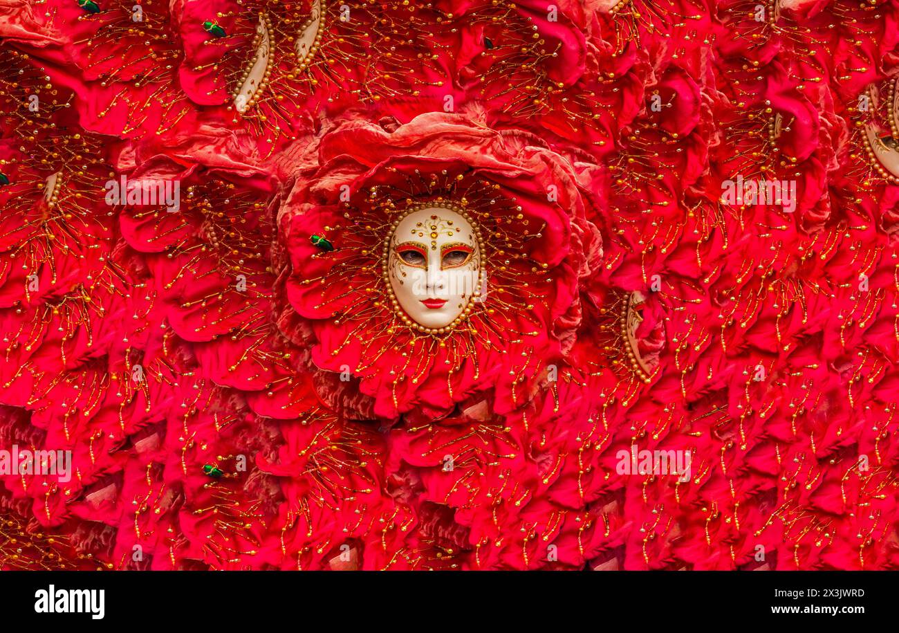 a stunning red carnival mask background for festive games Stock Photo ...