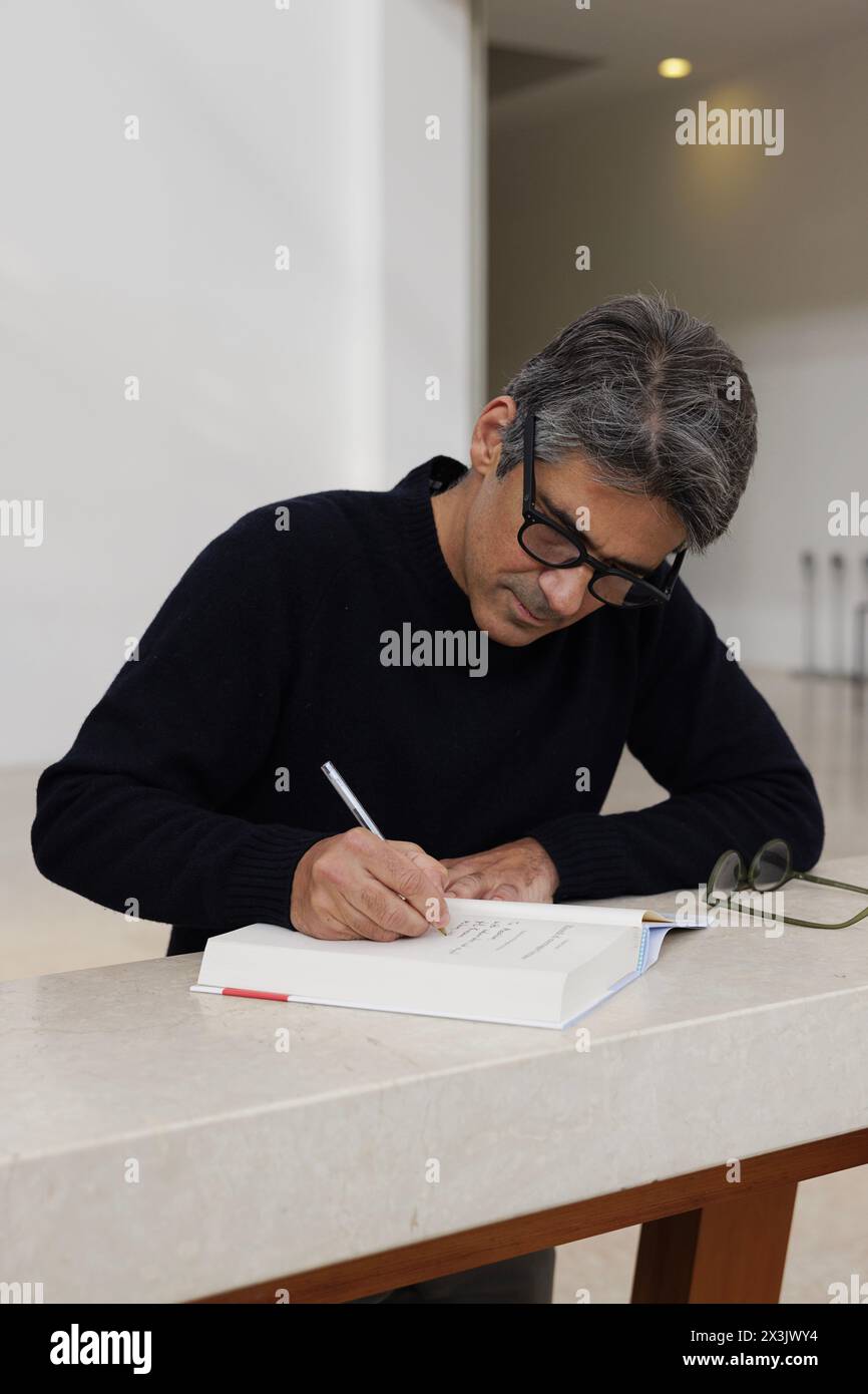 Portrait of Ali Kazma (artist) dedicating Orhan Pamuk’s book 19/11/2023 ...