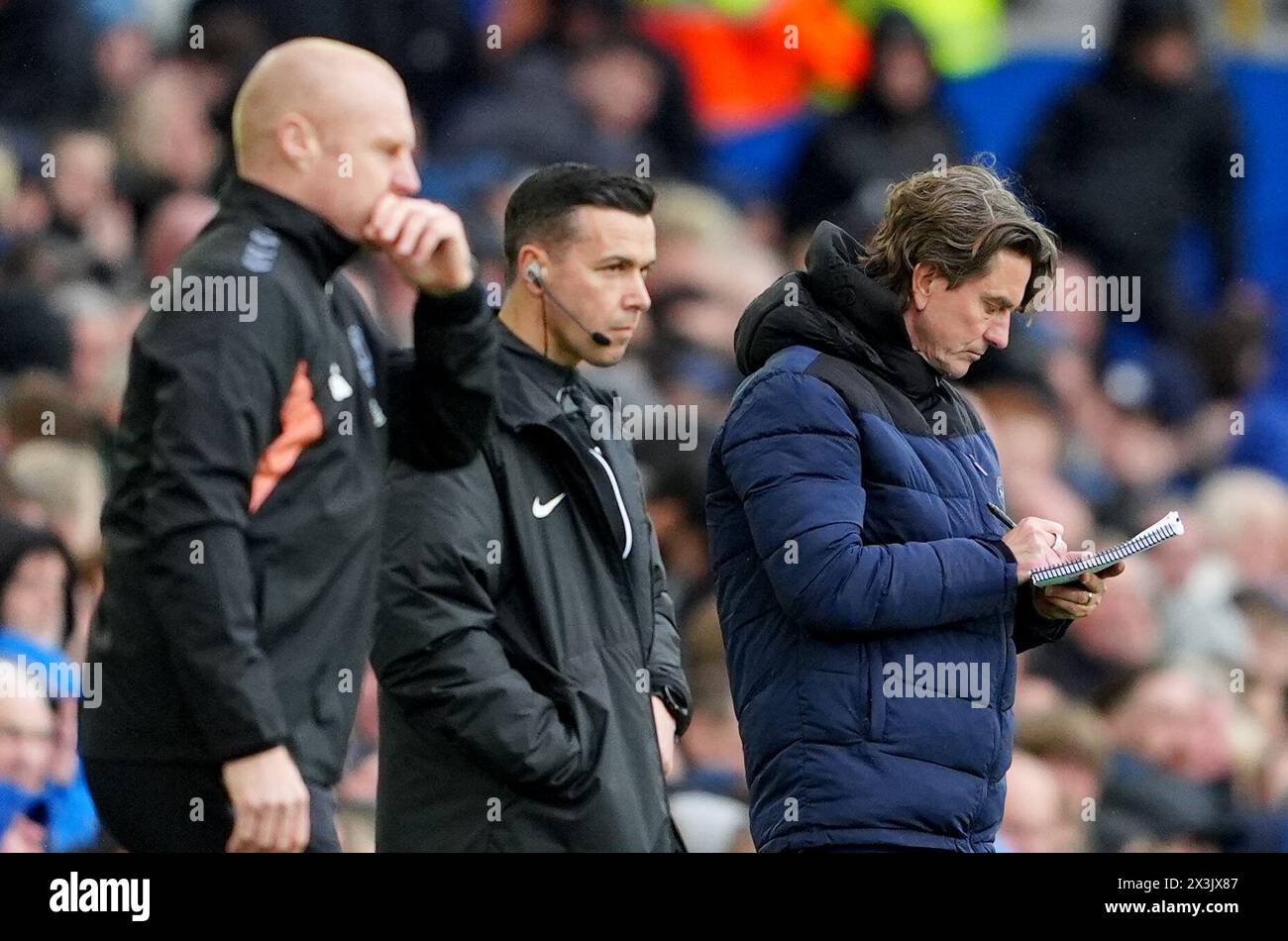 Brentford manager Thomas Frank (right) makes notes during the Premier ...