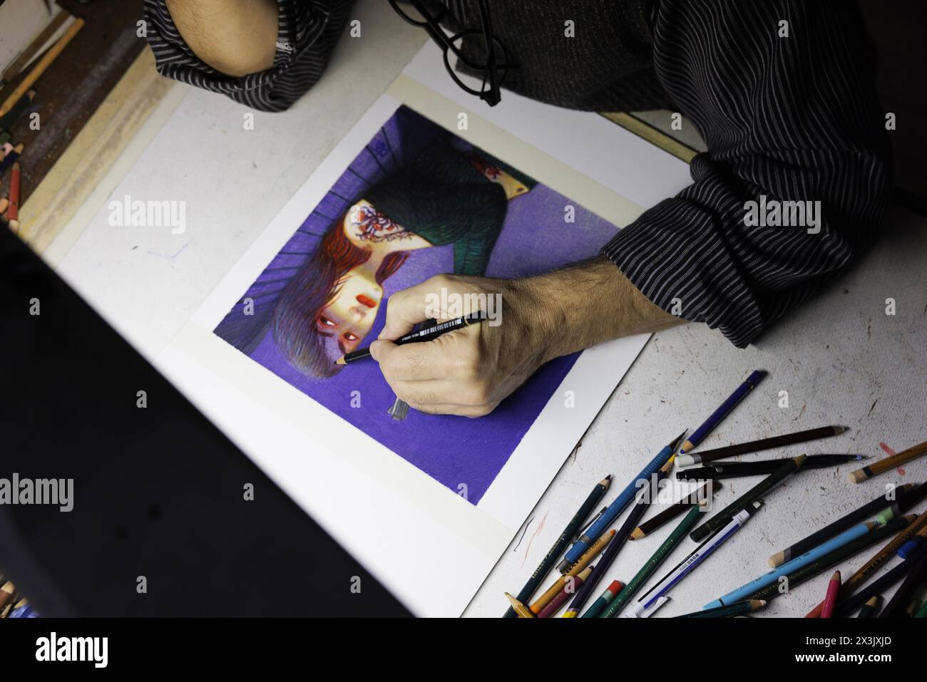 Portrait of Lorenzo Mattotti (illustrator) (hands) at his Parisian ...