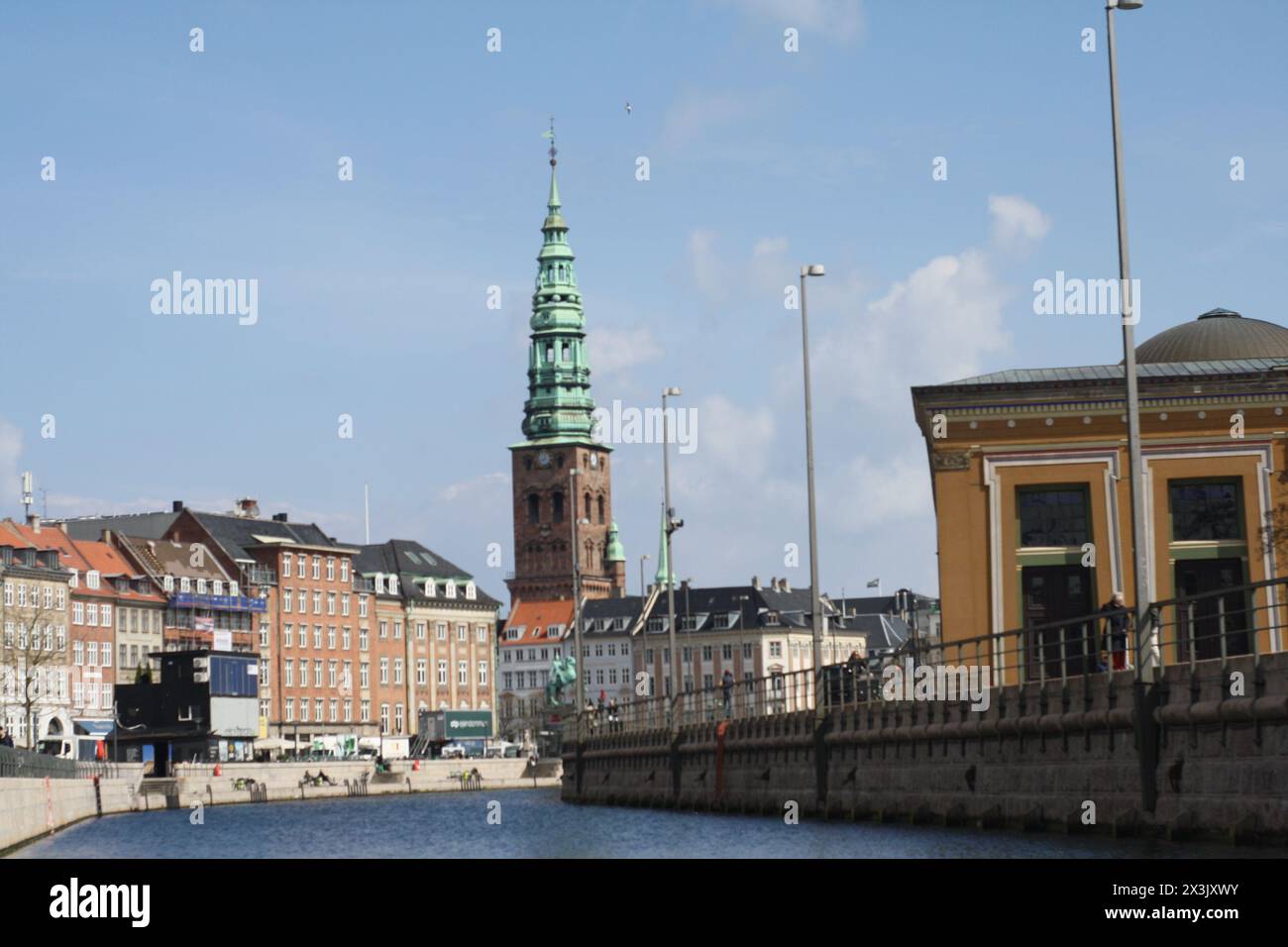 old port decorated with old buildings and ships as a tourist attraction ...