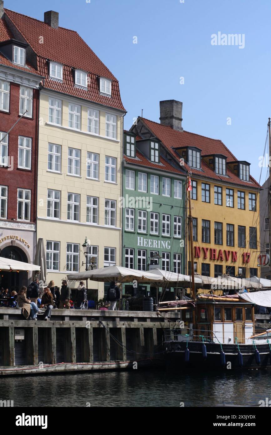 old port decorated with old buildings and ships as a tourist attraction ...