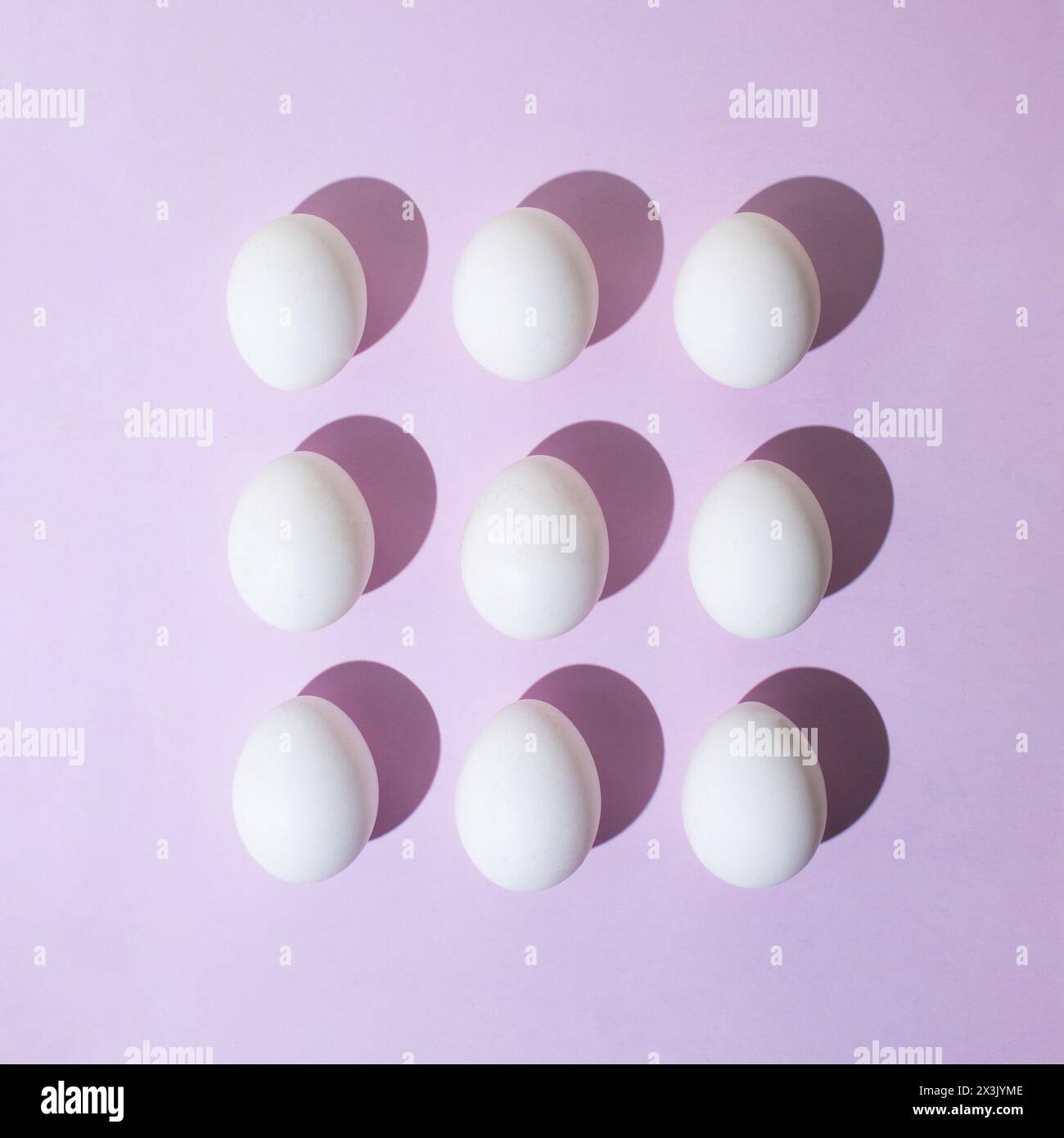 Creative layout made of eggs on pastel purple background. Flat lay ...