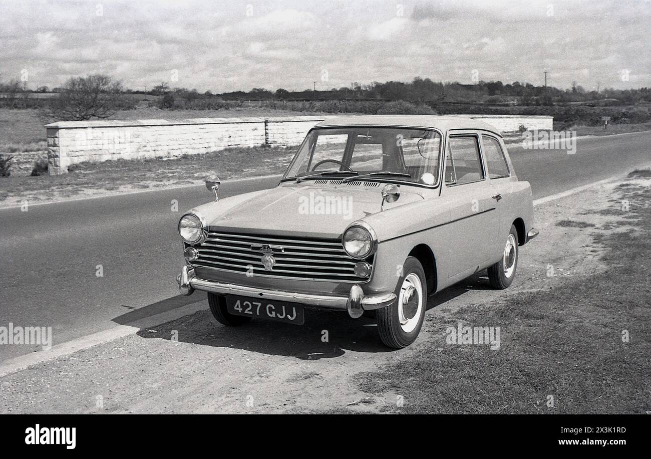 1960s, historical, a 2-door Austin A40 Farina car of the era parked ...