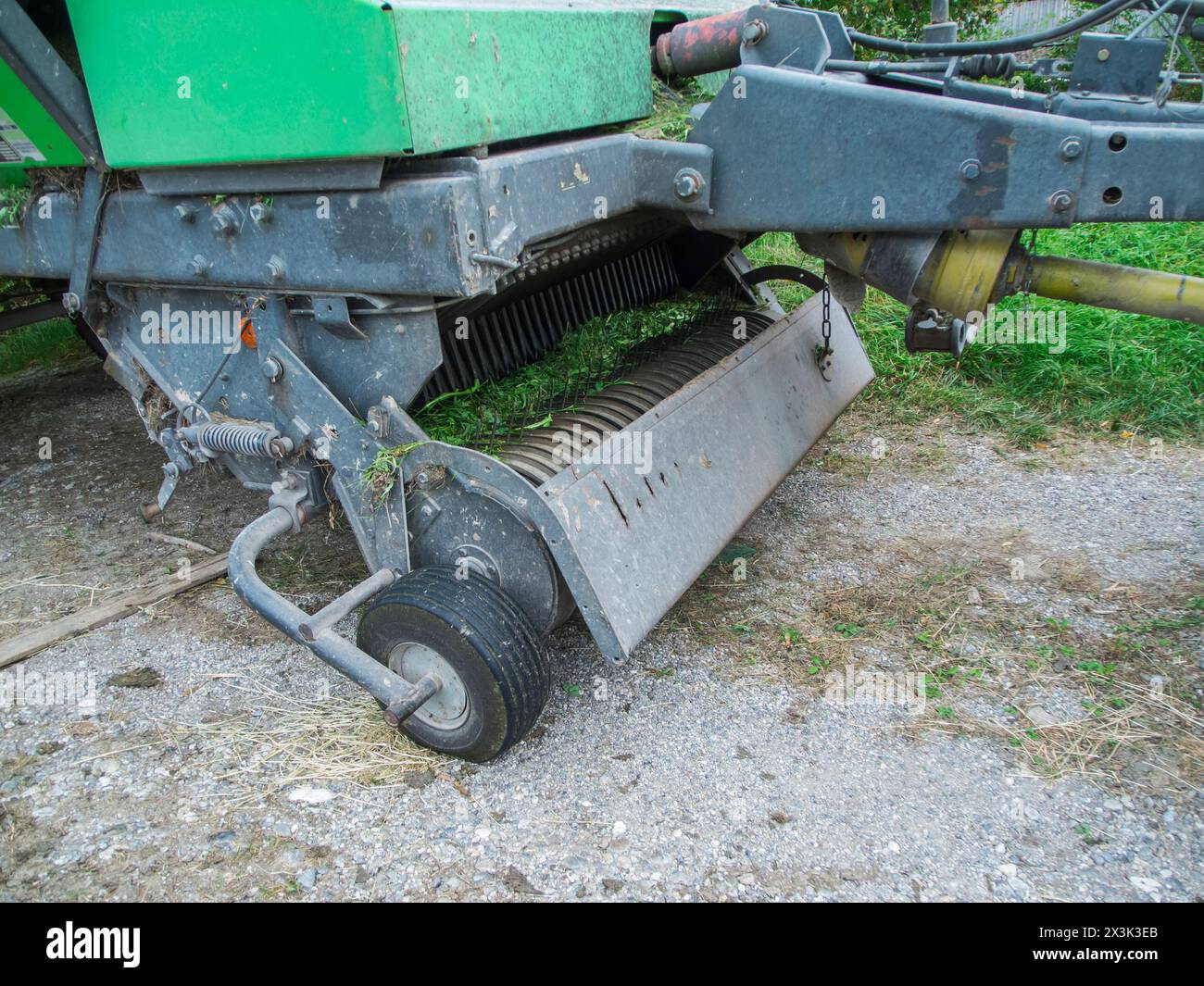 Partial view of the PTO spring tines and pickup roller of a baler on a ...