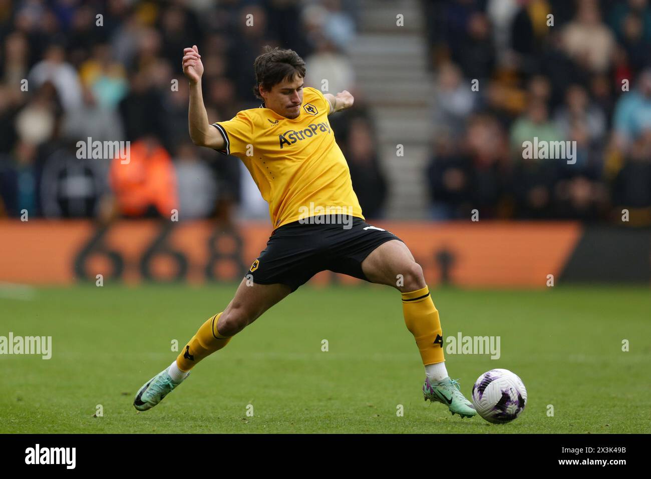 Hugo Bueno of Wolves in action during the Premier League match between ...