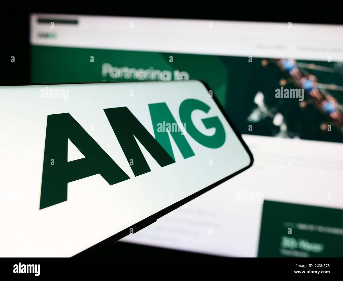 Mobile phone with logo of American company Affiliated Managers Group ...