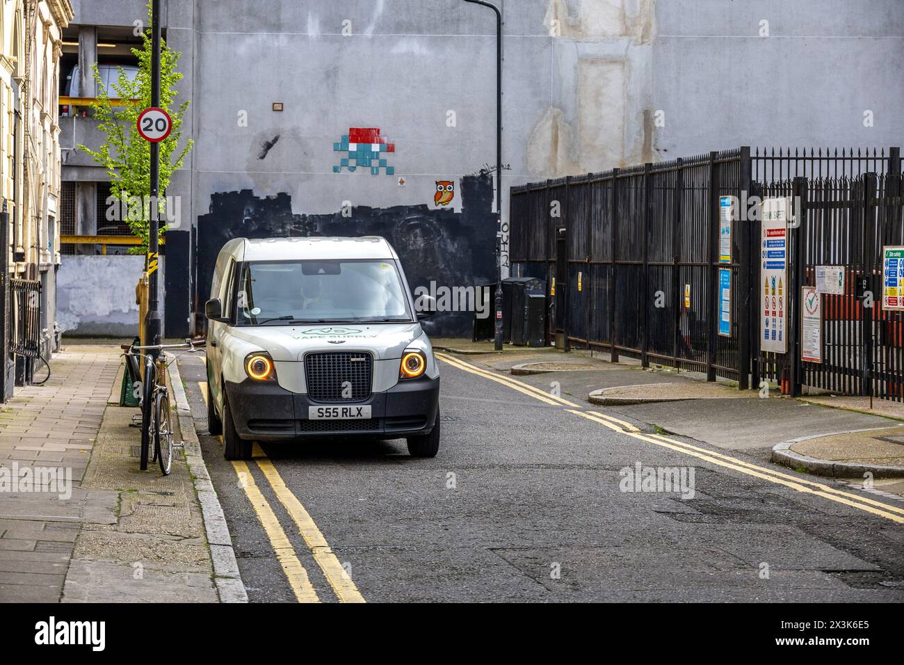 LEVC electric van, based on the London black cab, against urban art ...
