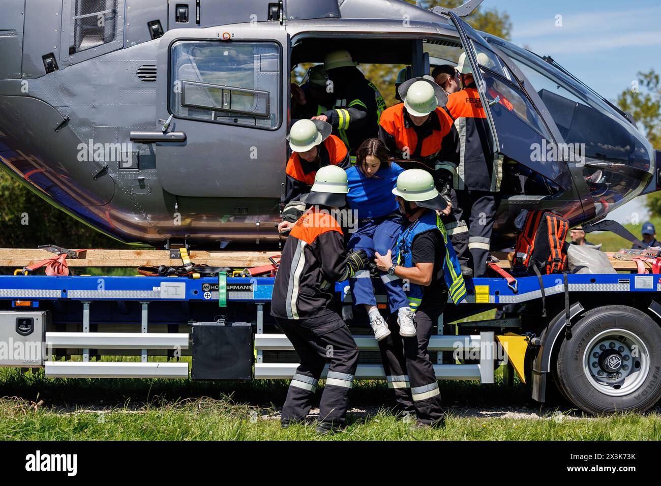 Ehingen, Germany. 27th Apr, 2024. Firefighters rescue passengers from ...
