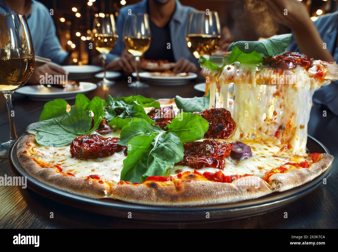 Talking colleagues eating pizza together hi-res stock photography and ...