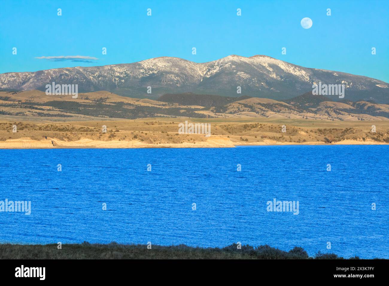 full moon rising over mount baldy in the big belt mountains and canyon ...