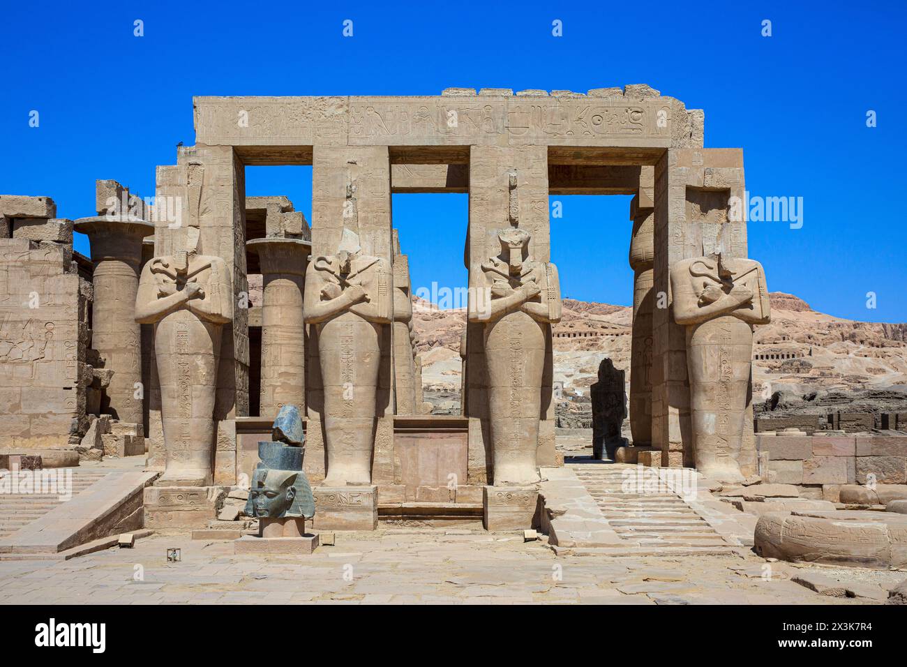 The Osiride statues of the Egyptian pharaoh Ramesses II at the ...