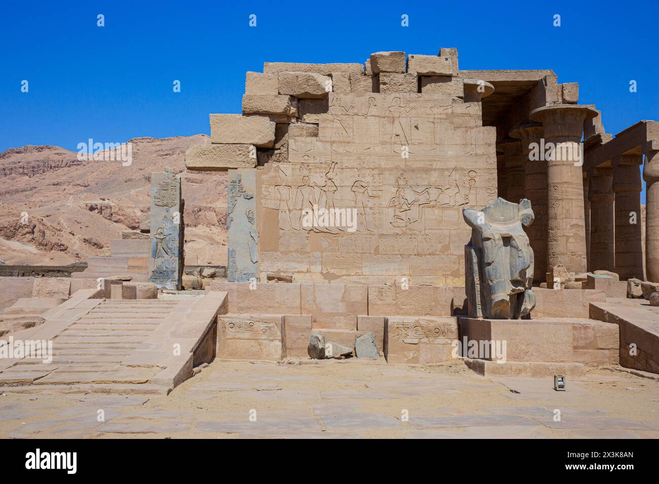 A relief depicting the God Thoth, Ramses II and the Theban family triad ...