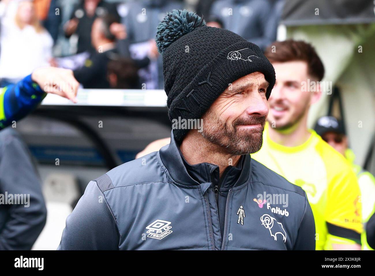 Derby, UK. 27th Apr, 2024. Derby County manager Paul Warne celebrates ...