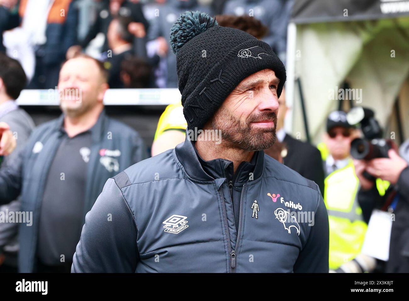 Derby, UK. 27th Apr, 2024. Derby County manager Paul Warne celebrates ...