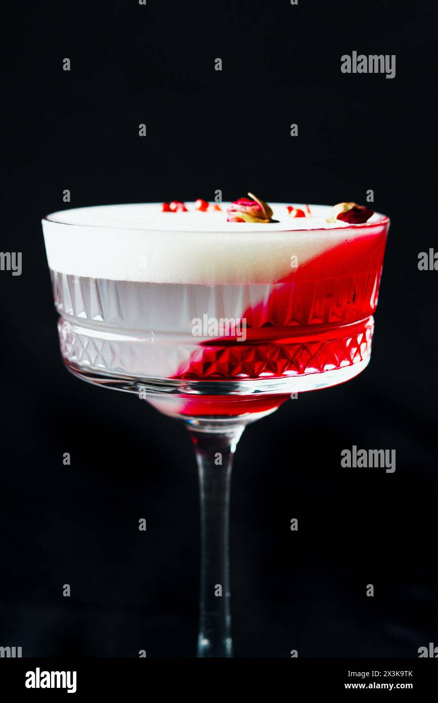 Alcoholic drink. A cocktail with elite alcohol on dark black background ...