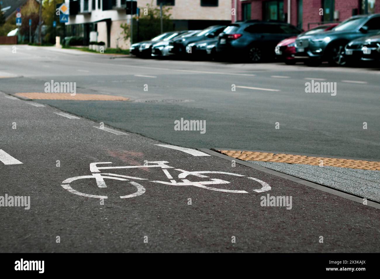 Bicycle route sign on the pavement Stock Photo - Alamy