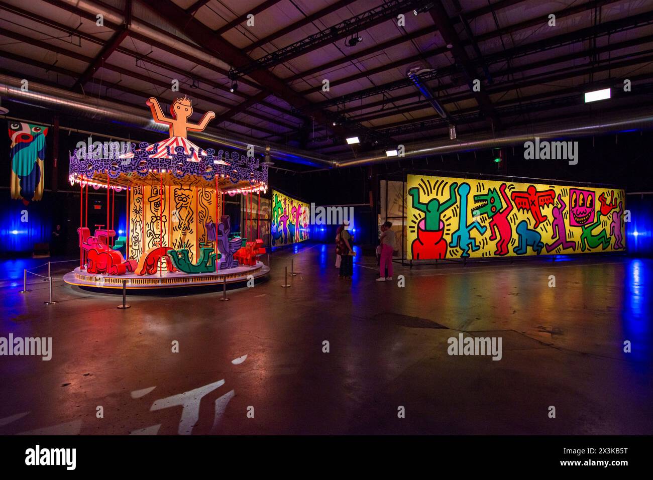 Industrially fabricated tarps and a painted carousel by Keith Haring ...