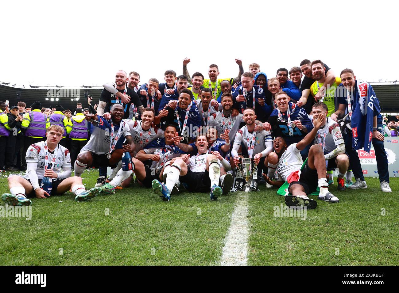 Derby, UK. 27th Apr, 2024. Derby County players celebrate promotion to ...