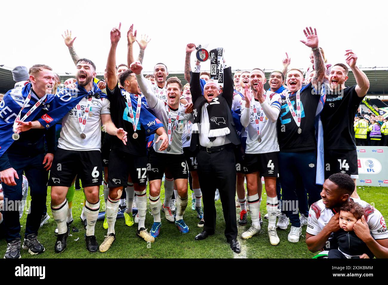 Derby, UK. 27th Apr, 2024. Derby County players celebrate promotion to ...