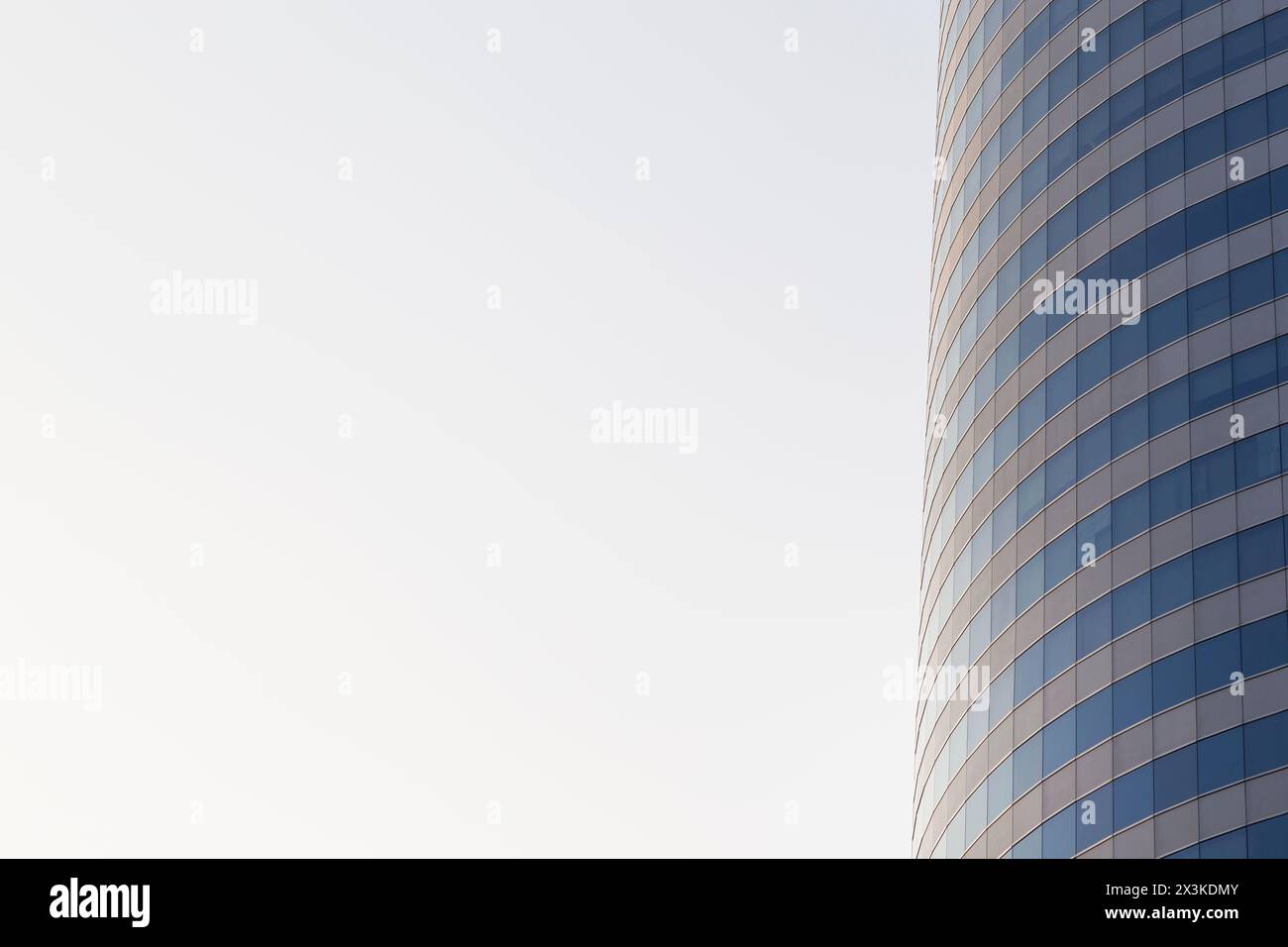 Facade of a modern and generic office skyscraper building seen from the ...