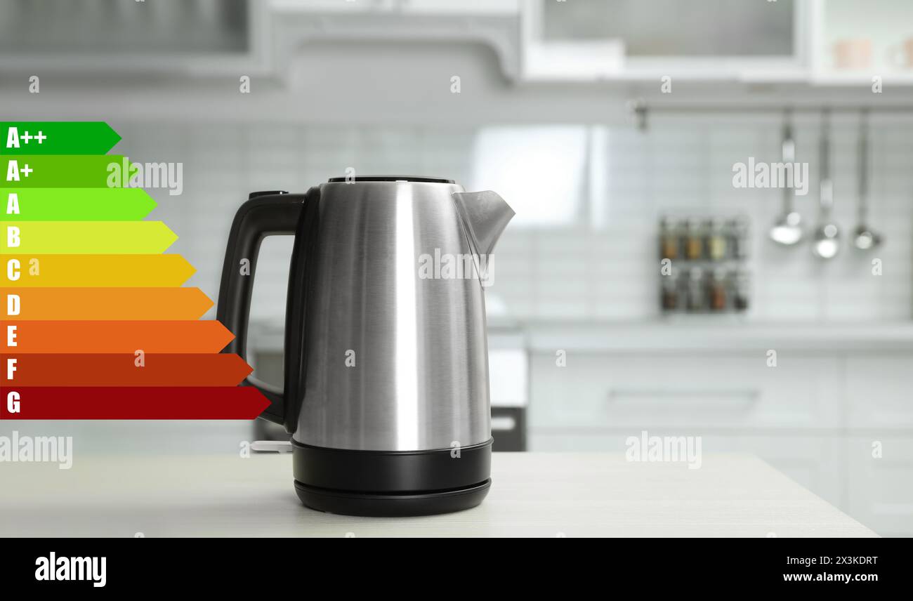 Energy efficiency rating label and electric kettle in kitchen Stock ...