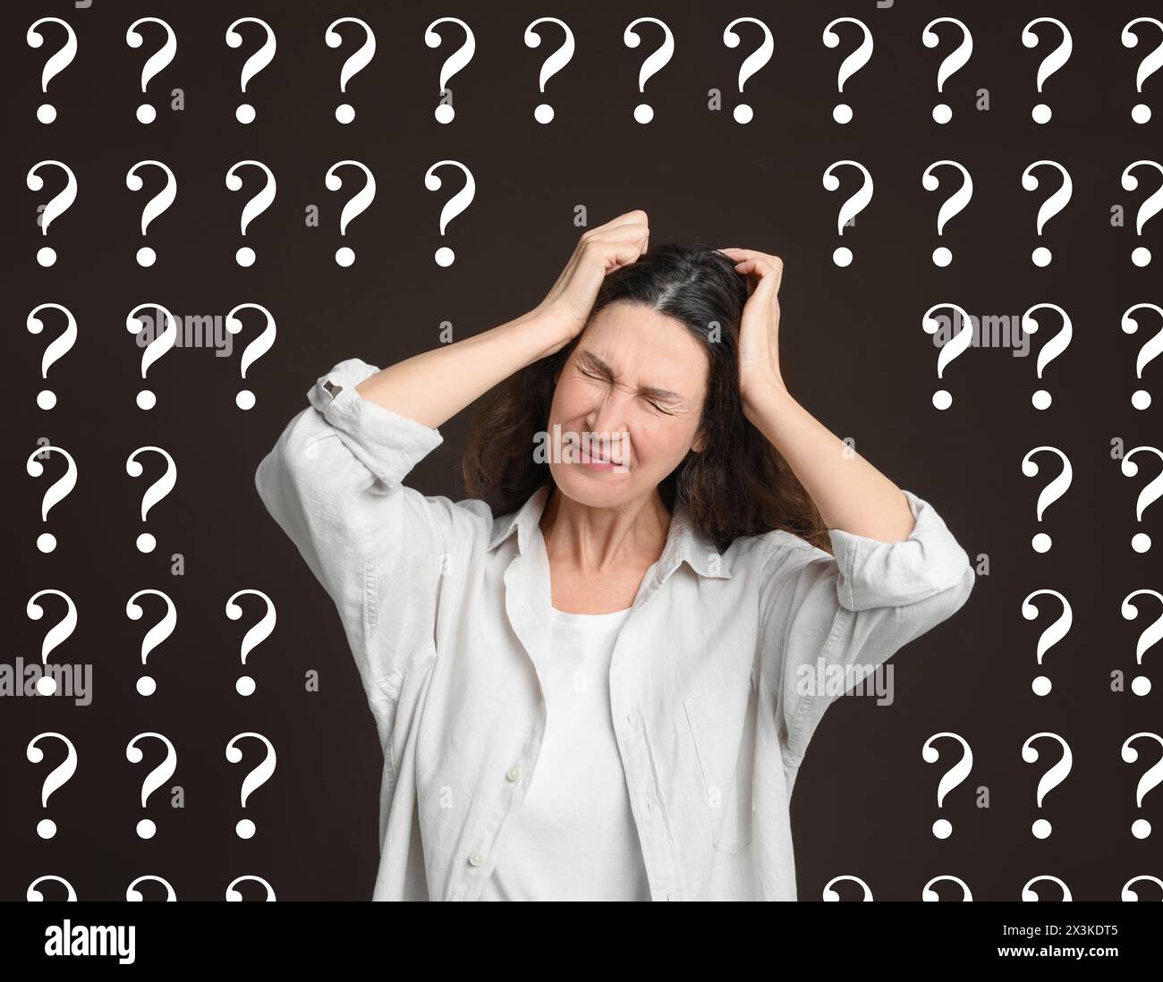 Amnesia Confused Woman And Question Marks On Brown Background Stock