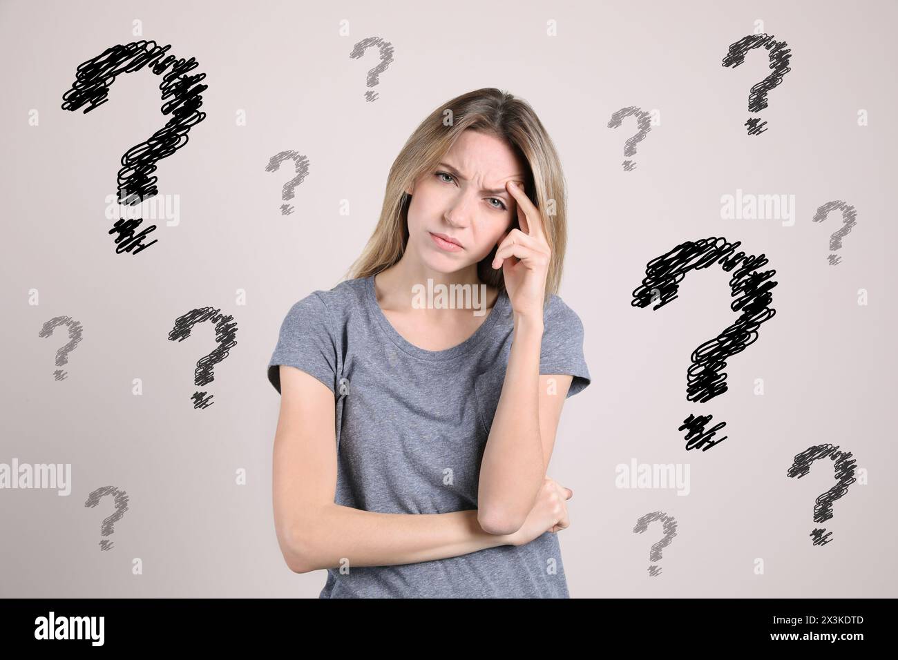 Amnesia Confused Young Woman And Question Marks On Light Background