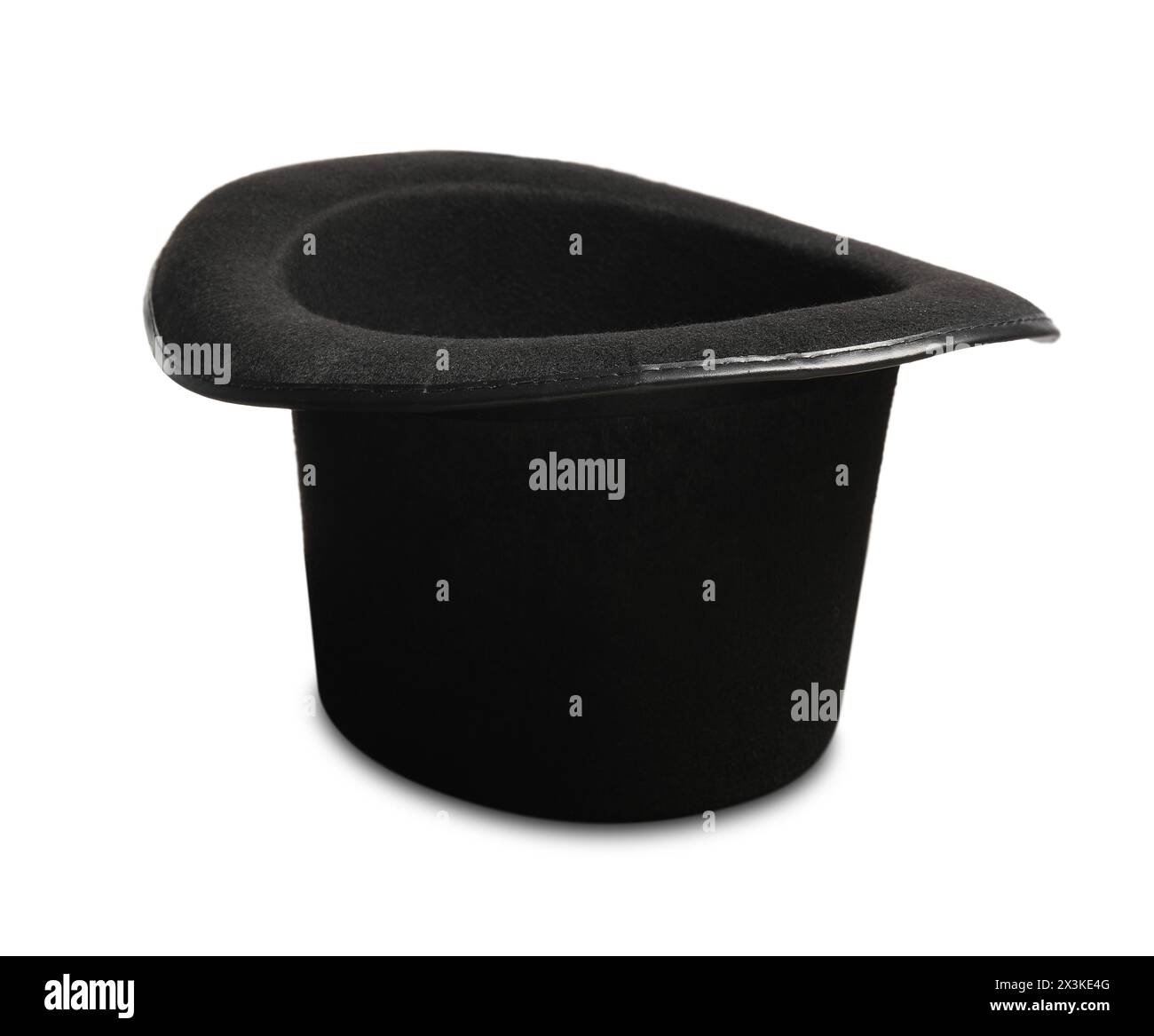 Magician's hat on wooden table against white background Stock Photo - Alamy