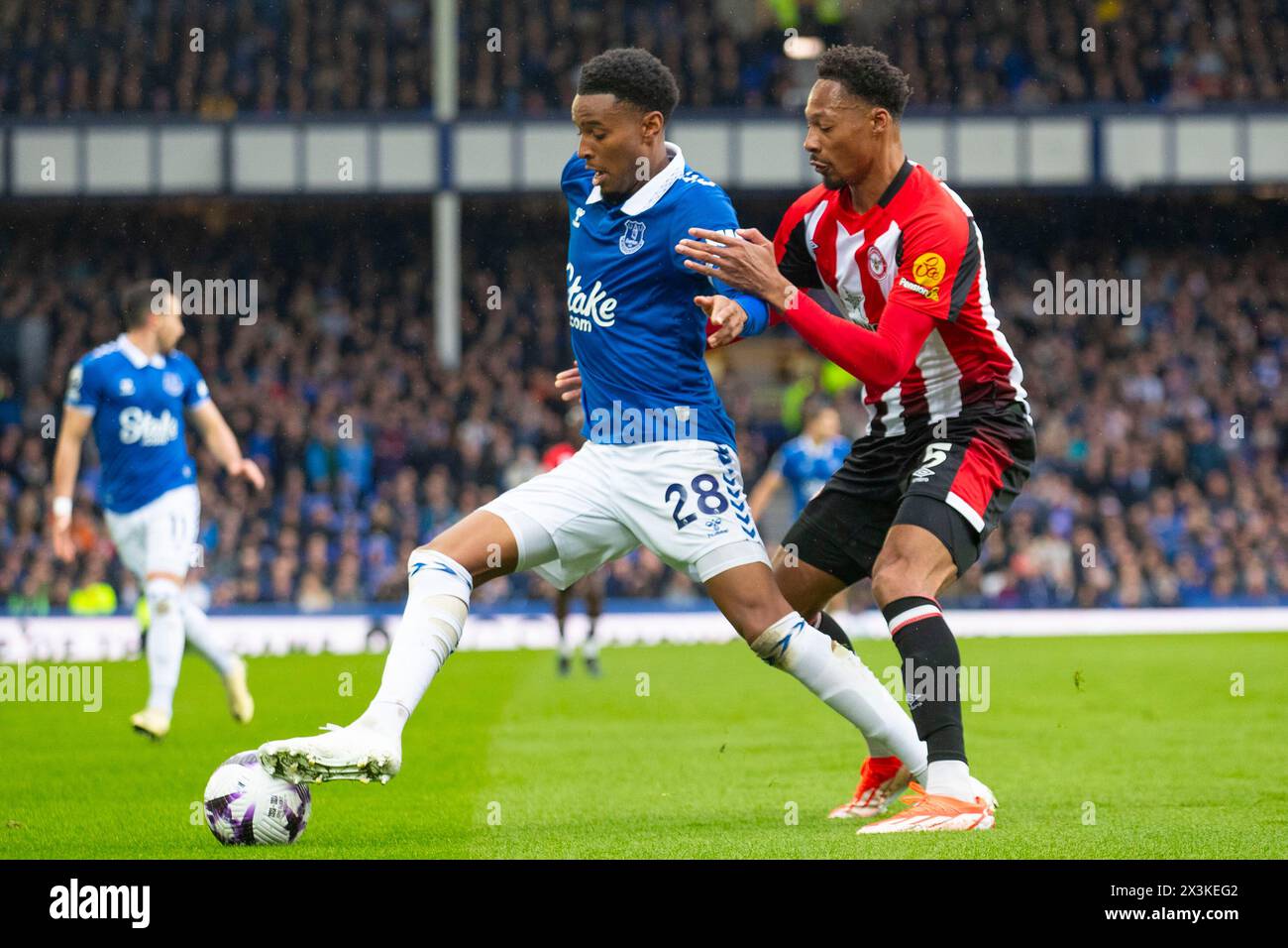 Youssef Chermiti #28 of Everton F.C challenged by the opponent during ...