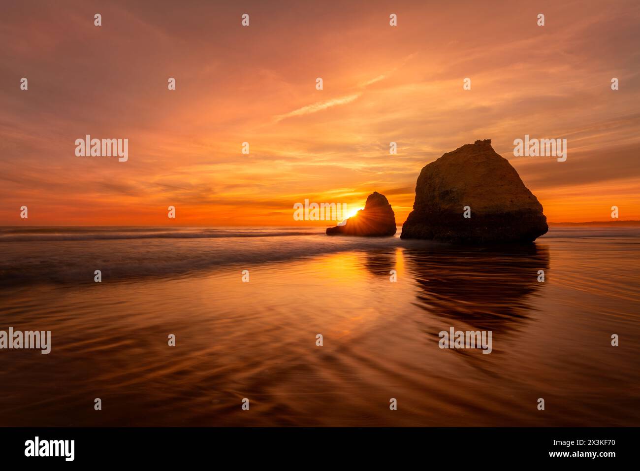Sunset on beach in alvor hi-res stock photography and images - Alamy