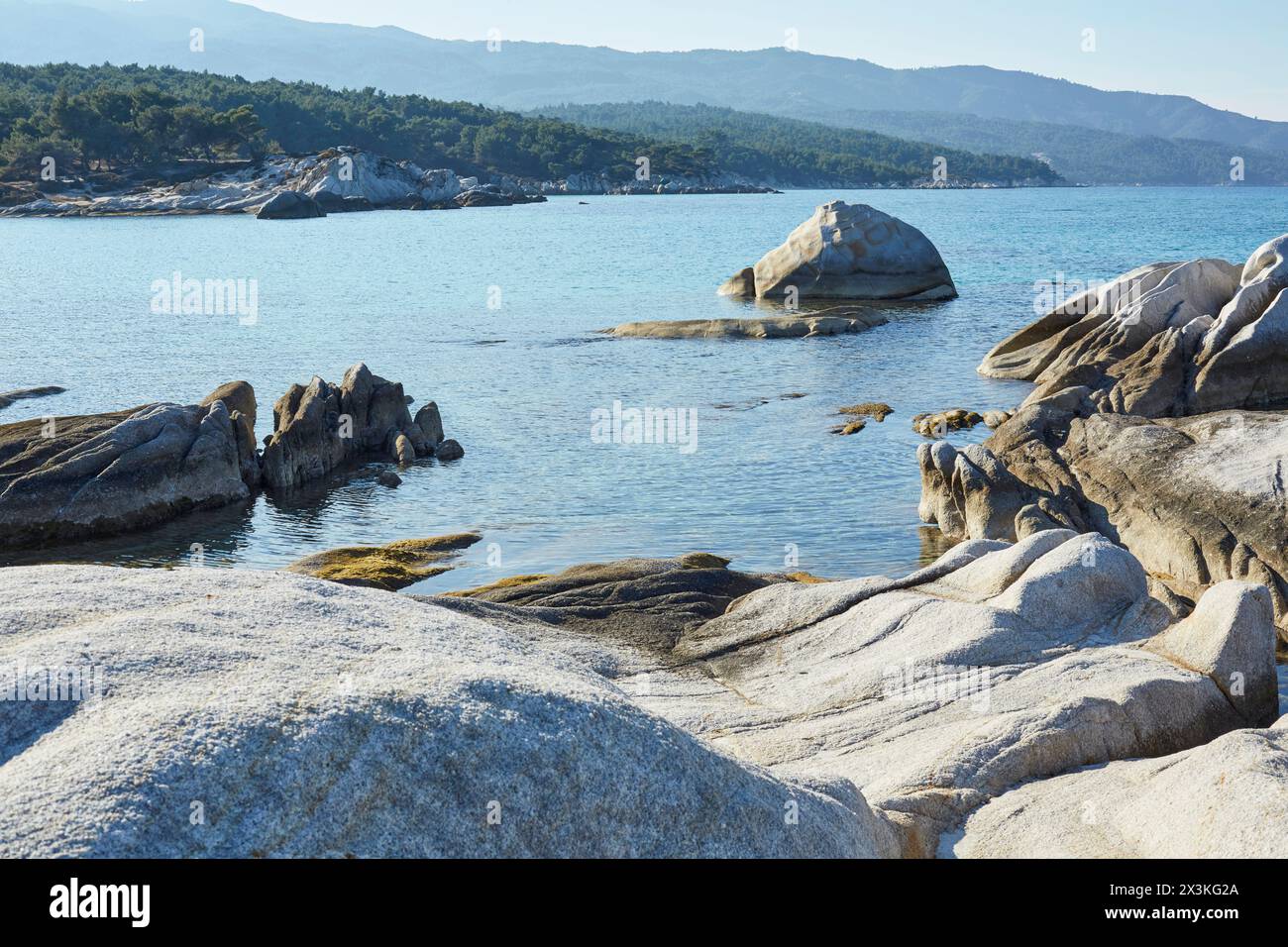 Beach with rocks in chalkidiki Greece Stock Photo - Alamy