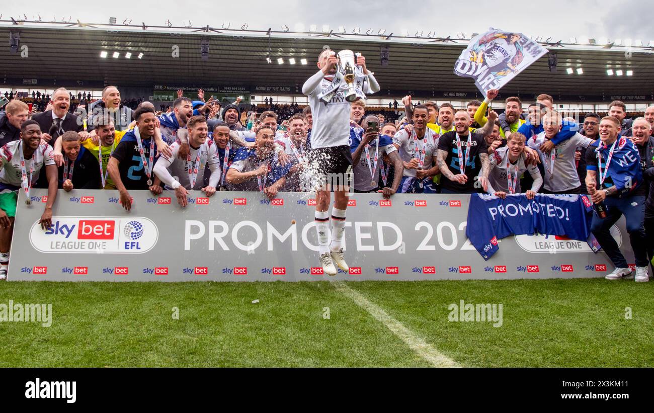 Derby, UK. 27th Apr, 2024. Derby County players celebrate winning the ...