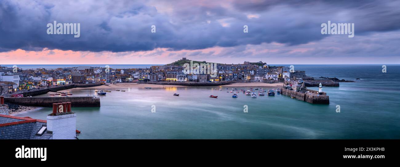 The seaside town of St Ives in Cornwall at sunset on a breezy late ...
