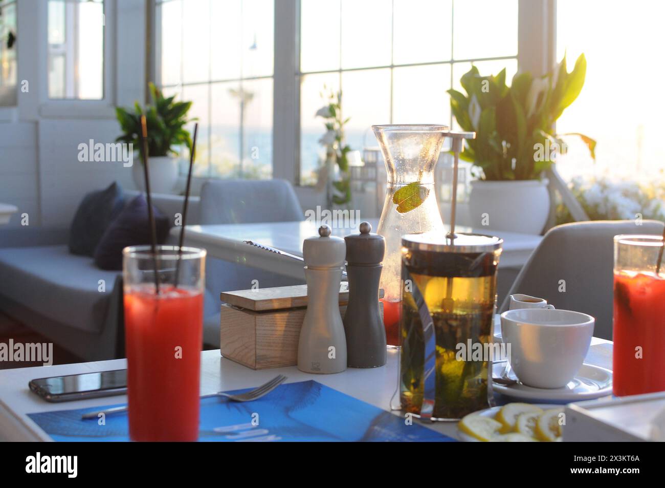Beautiful sunrise lighting in the morning with a hot coffee Stock Photo ...