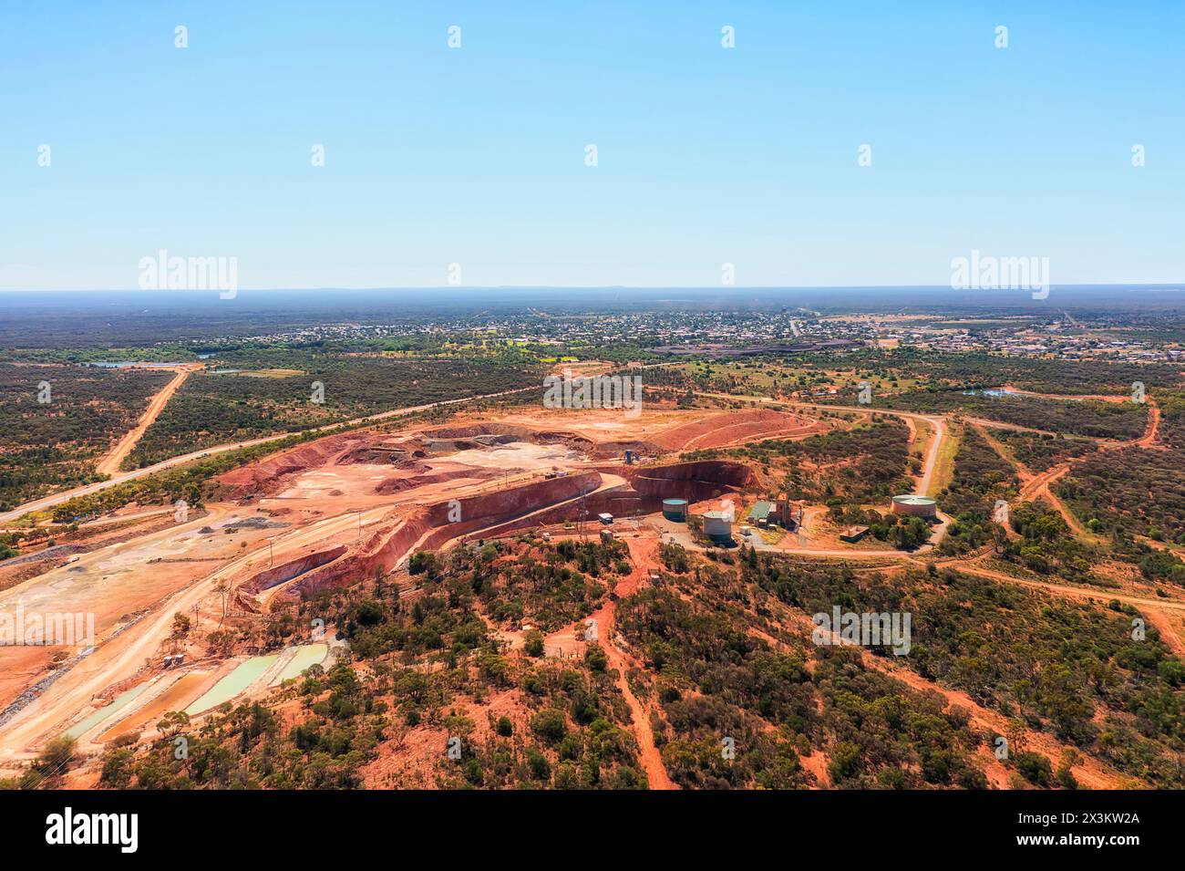 Scenic aerial landscape of Cobar copper mine and distant town in NSW of ...