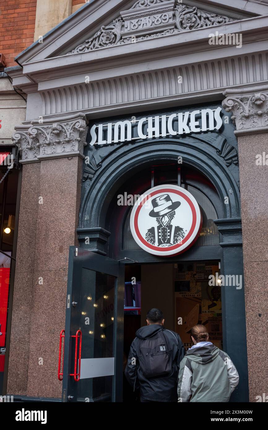 27th April 2024, London. Slim Chickens - fast food restaurant ...