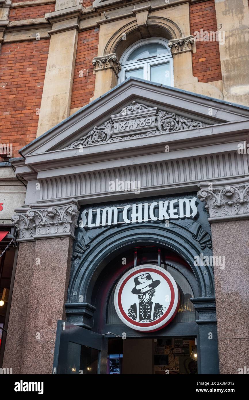 27th April 2024, London. Slim Chickens - fast food restaurant ...