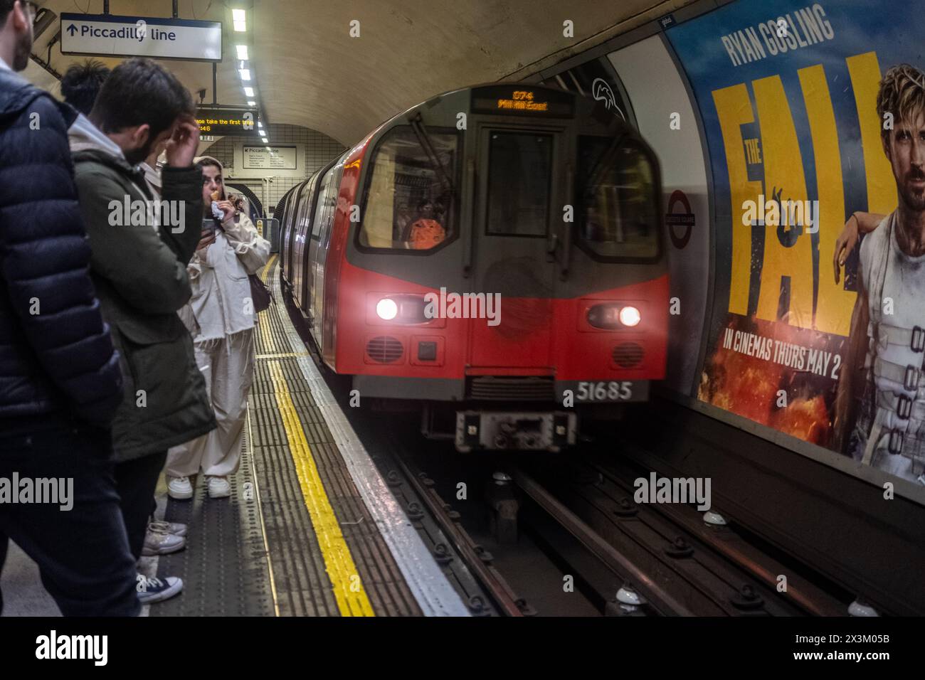27th April 2024, London - Underground train pulls into Leicester Square ...