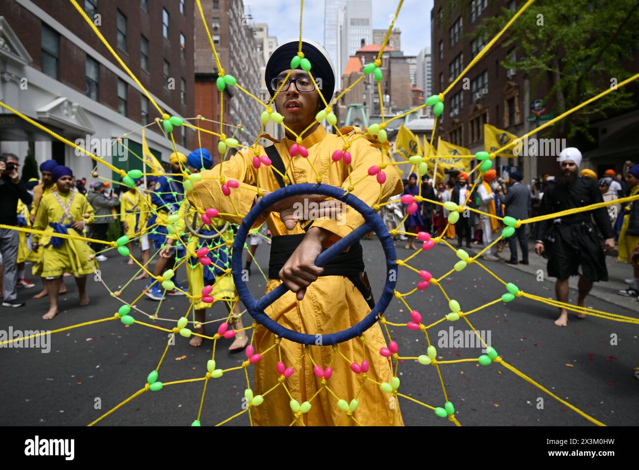 Participants march in the Sikh Cultural Society's Sikh Day Parade on ...
