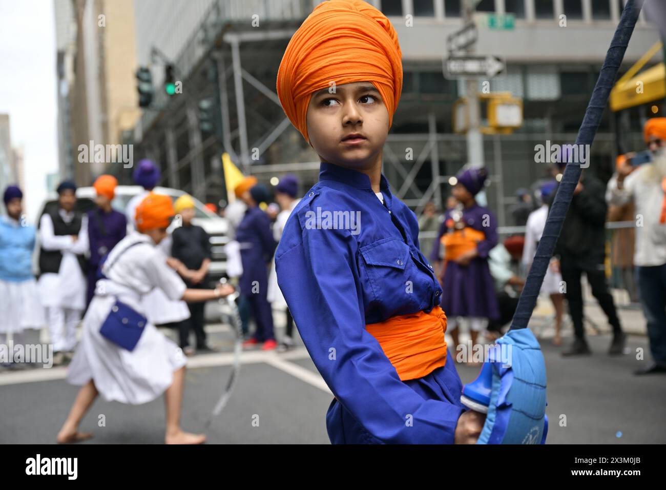 Participants march in the Sikh Cultural Society's Sikh Day Parade on ...