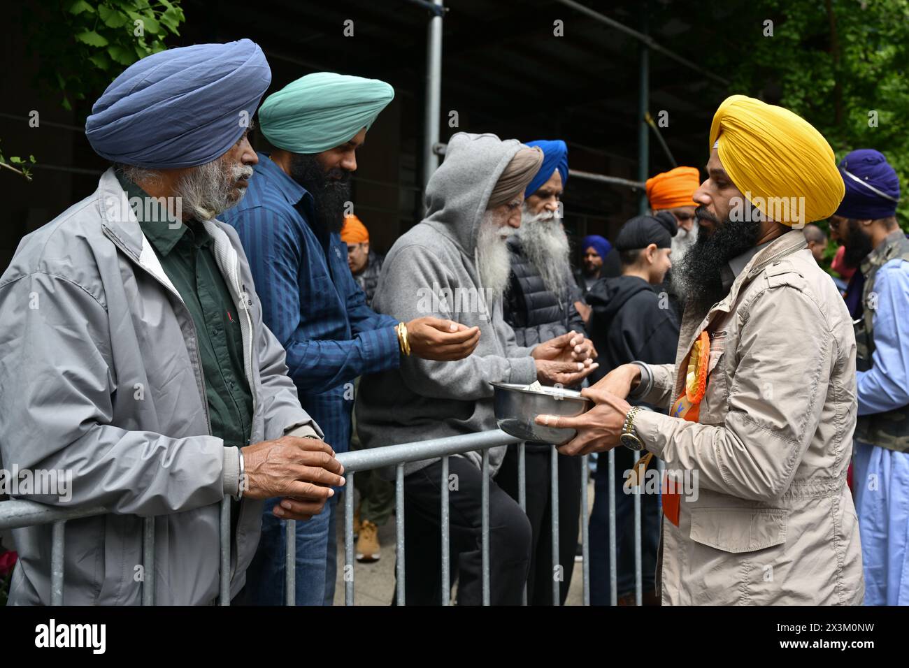 Participants march in the Sikh Cultural Society's Sikh Day Parade on April 27, 2024 in New York ...
