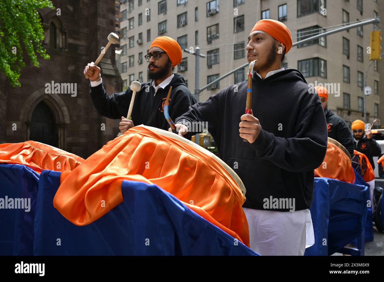 Participants march in the Sikh Cultural Society's Sikh Day Parade on April 27, 2024 in New York ...