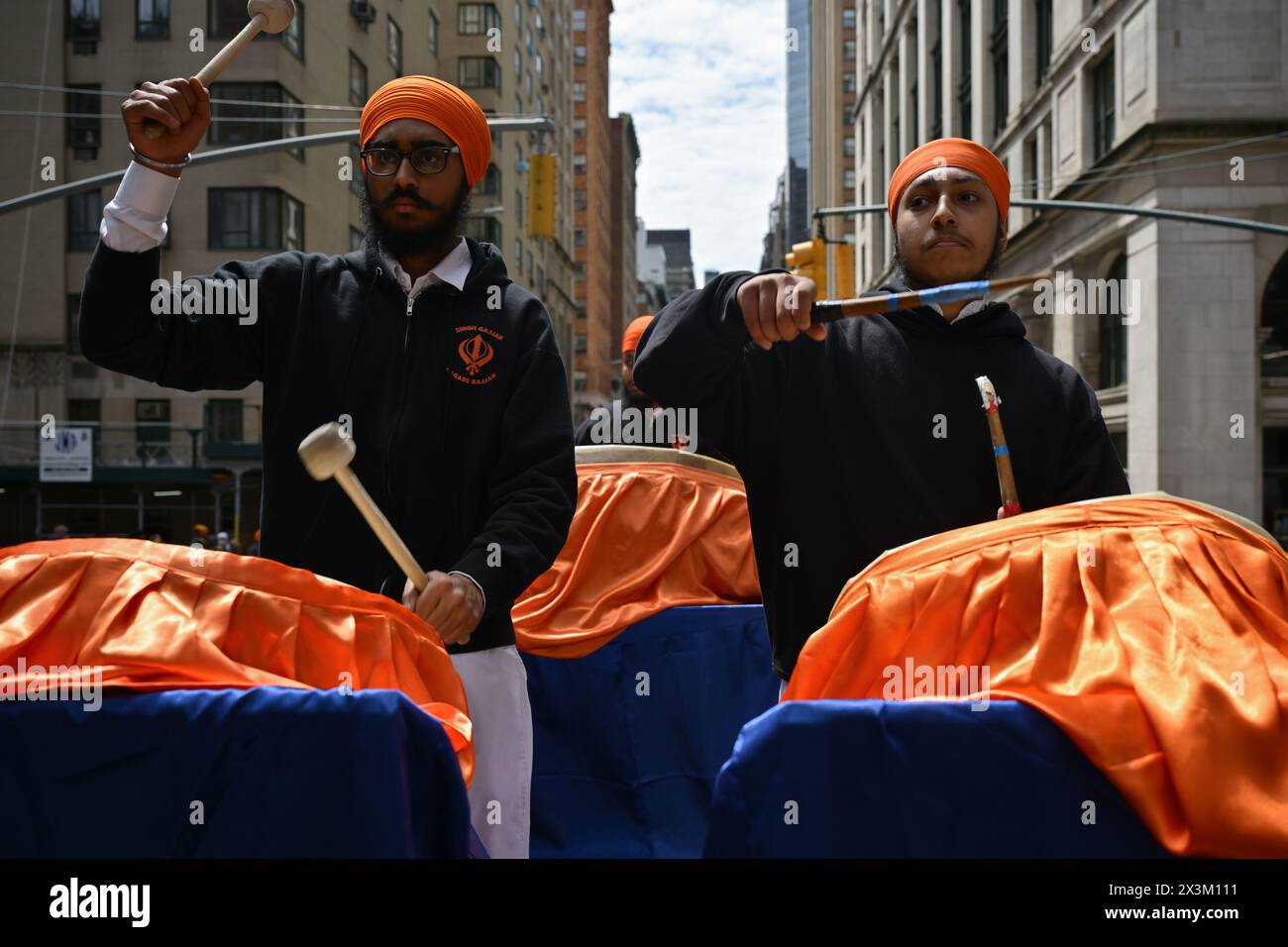 Participants march in the Sikh Cultural Society's Sikh Day Parade on April 27, 2024 in New York ...