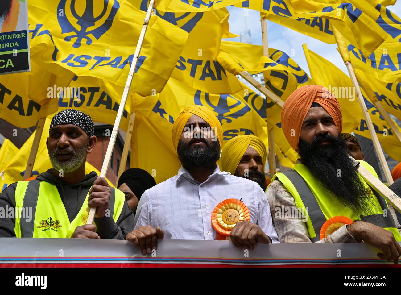 Participants march in the Sikh Cultural Society's Sikh Day Parade on April 27, 2024 in New York ...