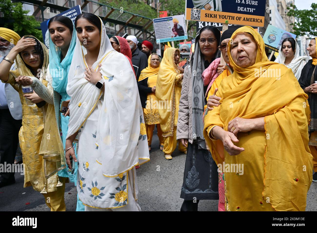 Participants march in the Sikh Cultural Society's Sikh Day Parade on ...