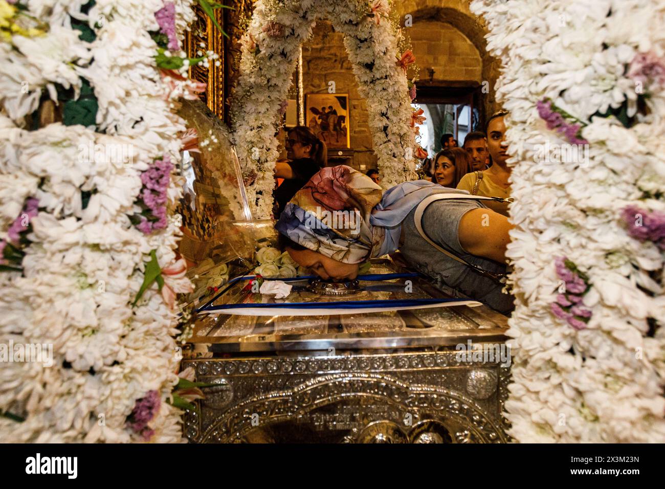 Larnaca, Larnaca, Cyprus. 27th Apr, 2024. A believer worships the ...