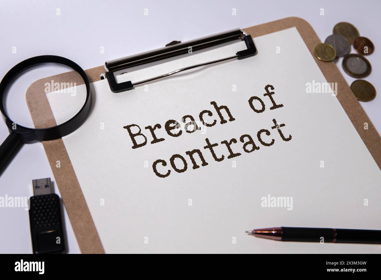 Breach of contract is shown using a text and photo of court gavel Stock ...